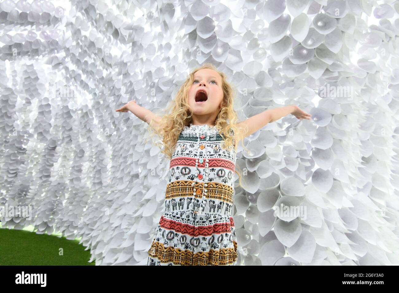 EDITORIAL USE ONLY Amelie, aged 5, (surname not given) enjoys an ...