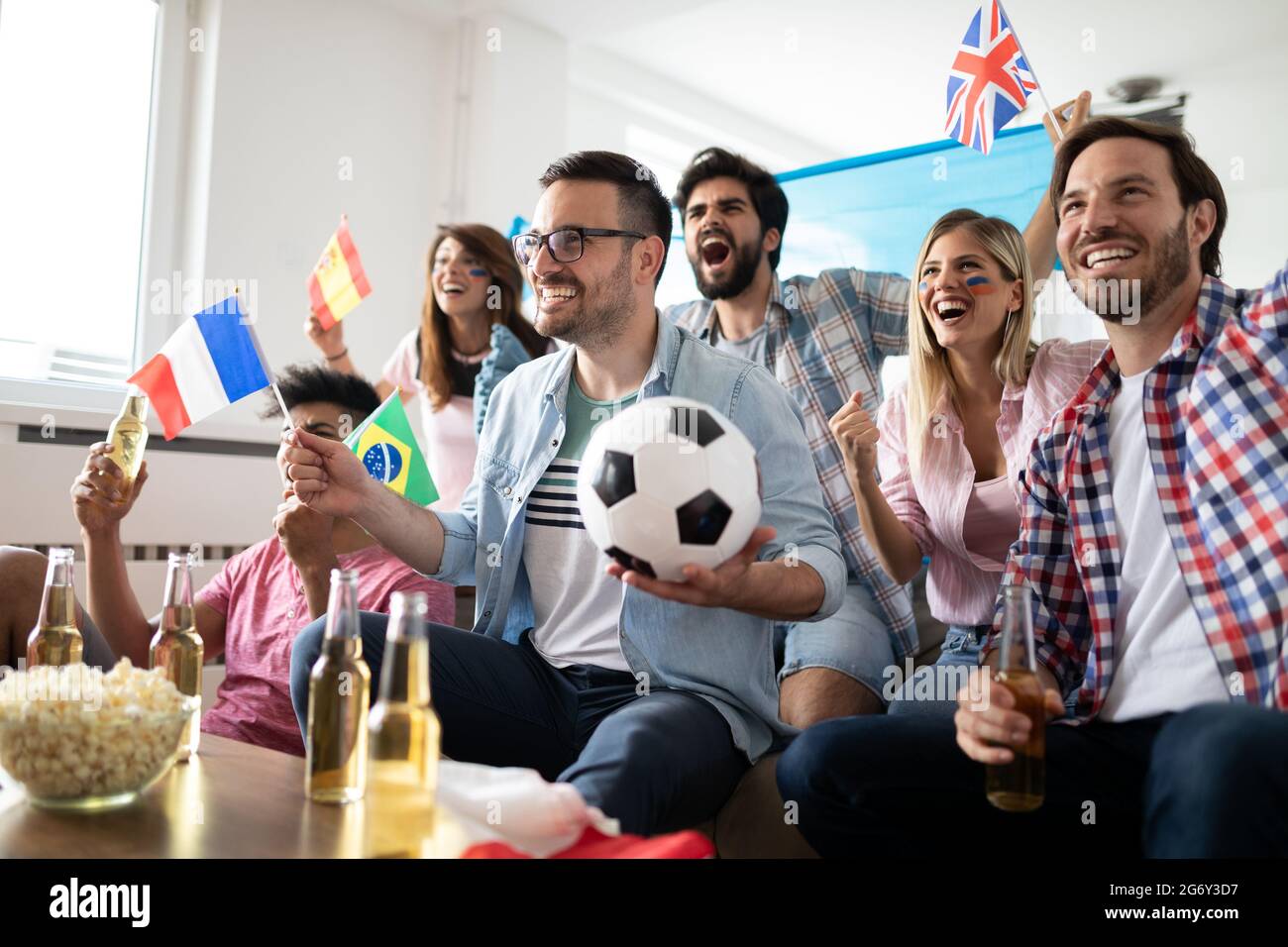Excited group young sports fans hi-res stock photography and images - Alamy