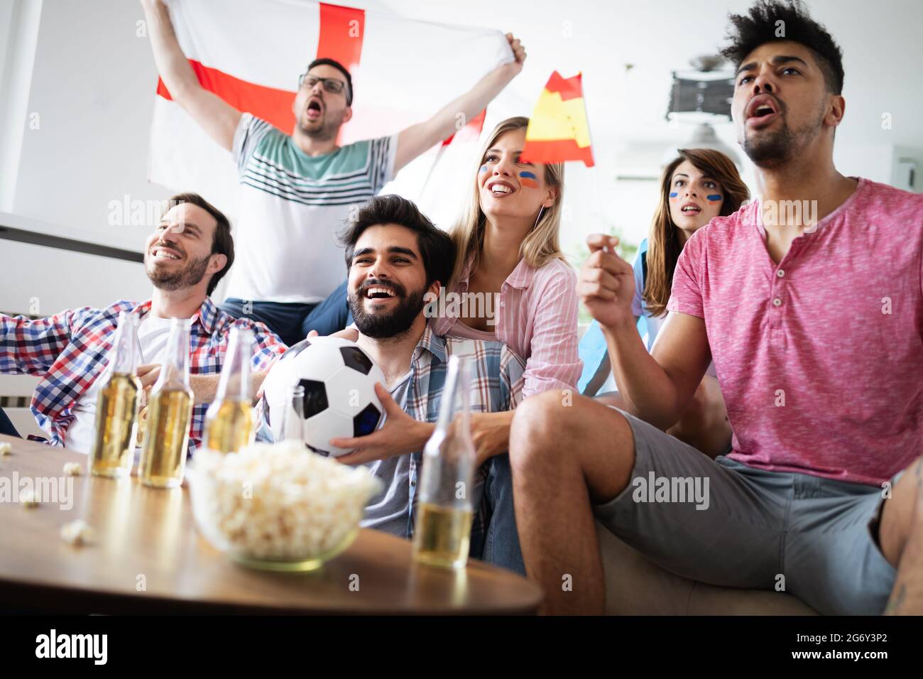 Couple watching the olympic games hi-res stock photography and images ...