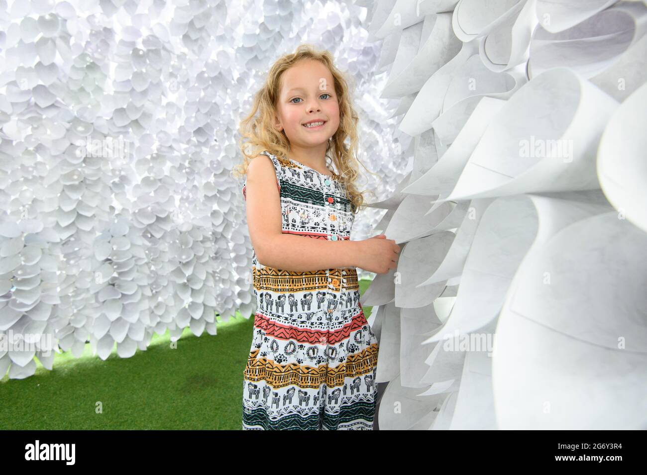 EDITORIAL USE ONLY Amelie, aged 5, (surname not given) enjoys an ...