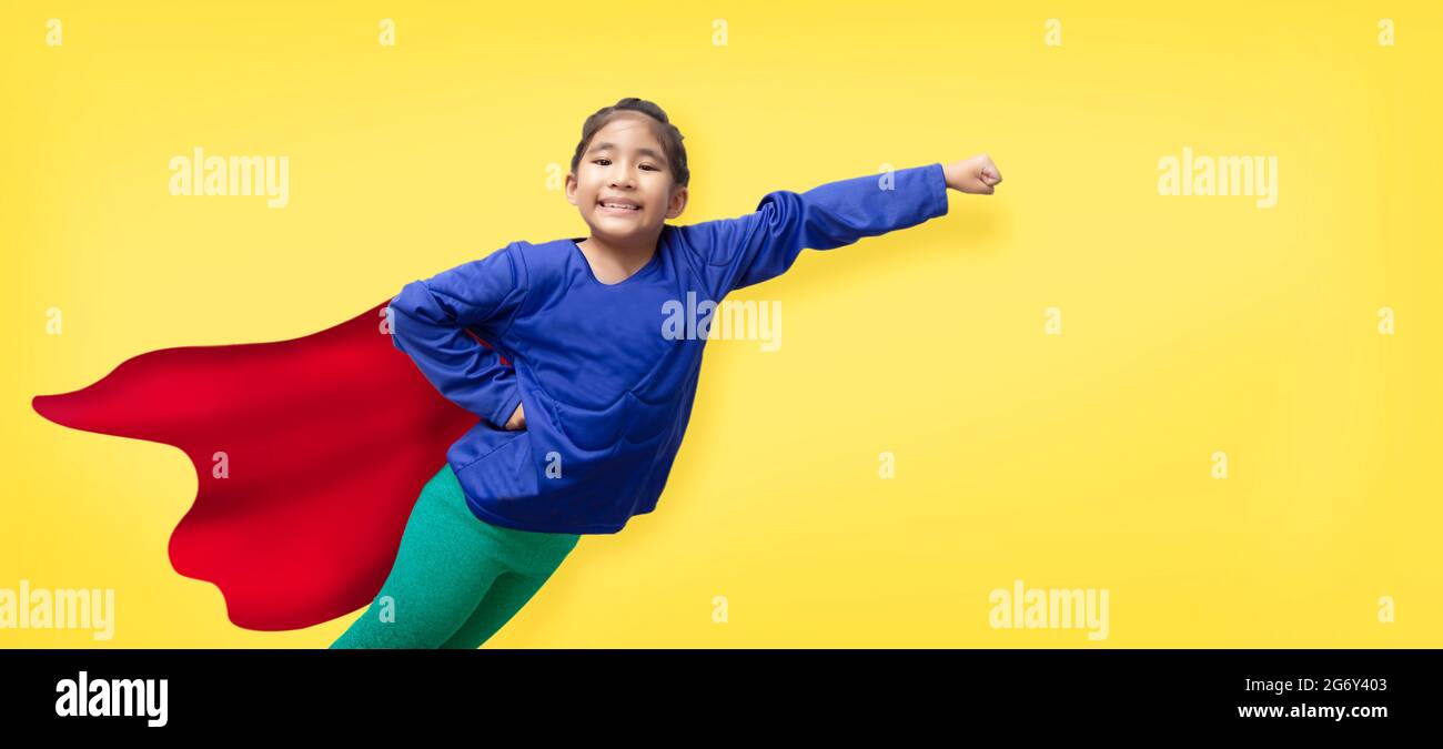 strong heroes concept. The asian girl model in action with superheros ...