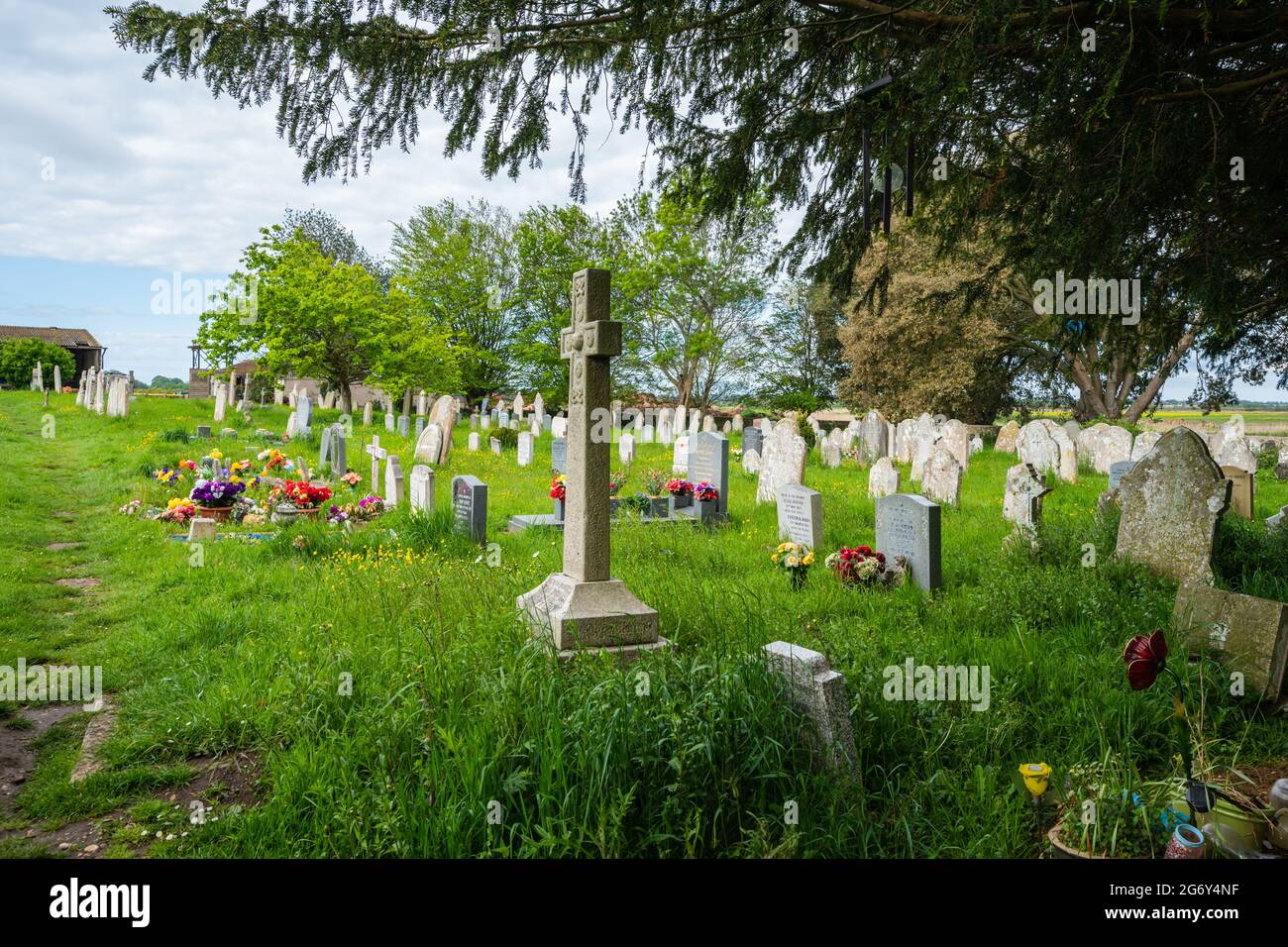 Graveyard cemetery at St Mary Magdalene Church, a historic Saxon church ...