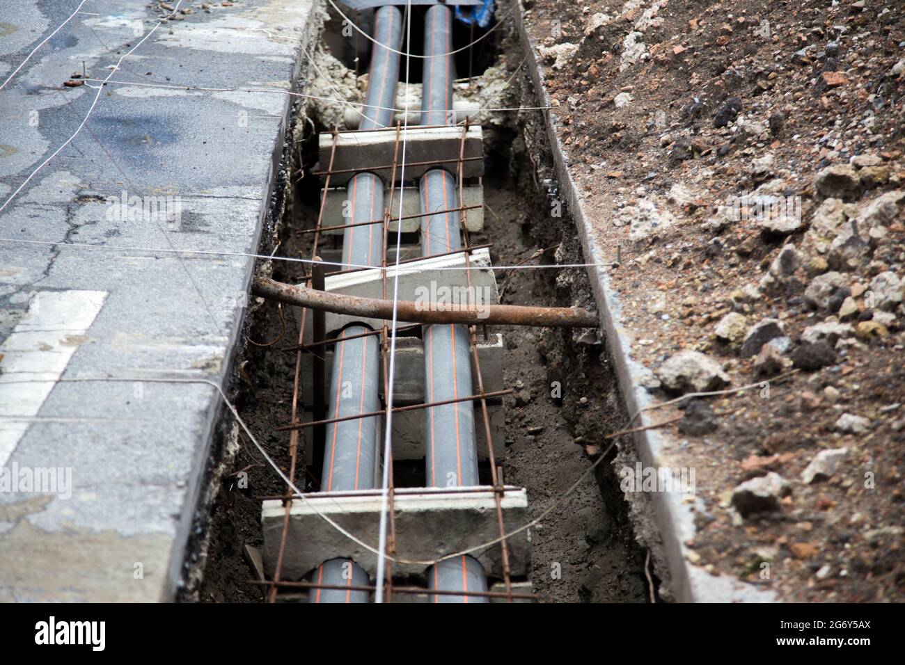 construction electric fiber underground of street with cement blog in ...