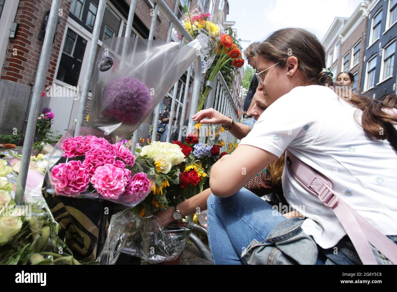 People lay flowers in vigil for the Dutch journalist Peter R de Vries ...