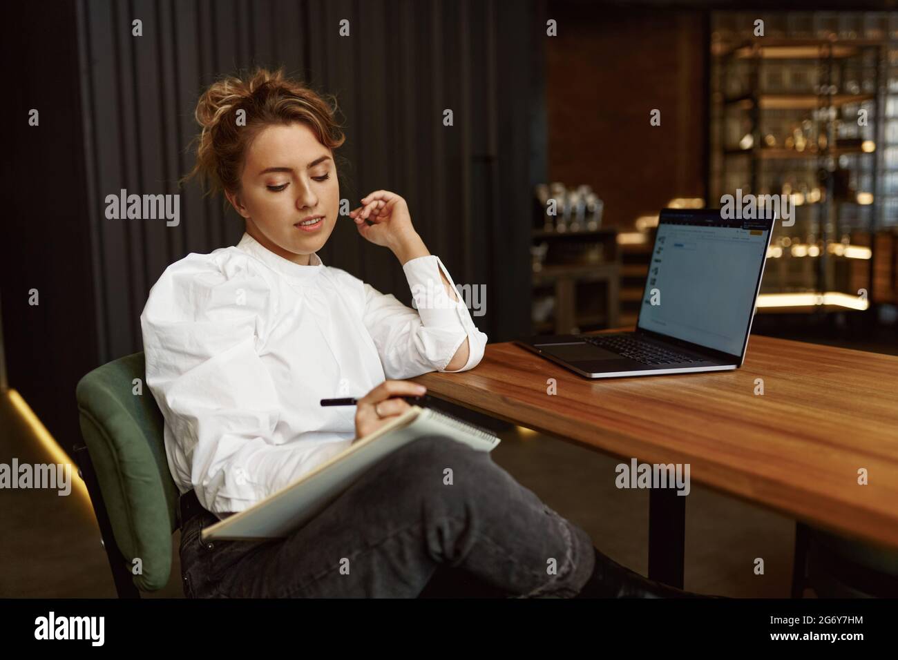 Woman writing notes hi-res stock photography and images - Alamy
