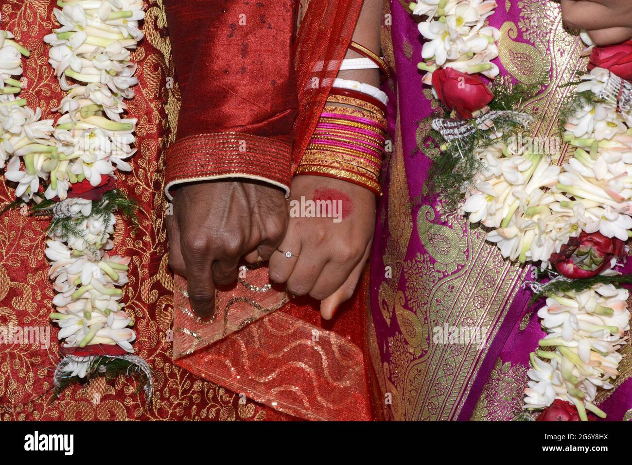 Shot indian couple holding hands hi-res stock photography and images - Alamy