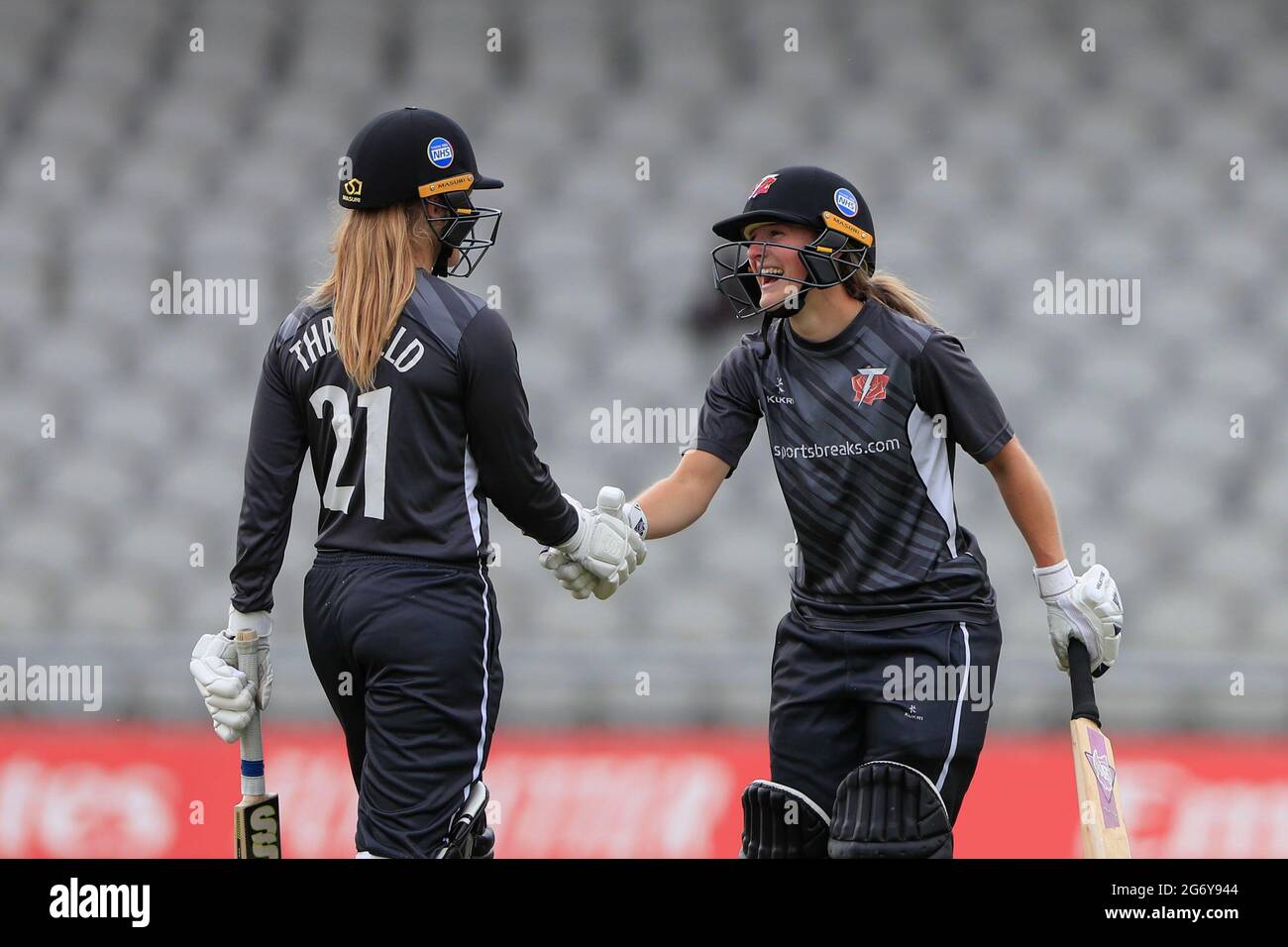 Emma Lamb batting for Thunder celebrates her 50 runs with Ellie ...