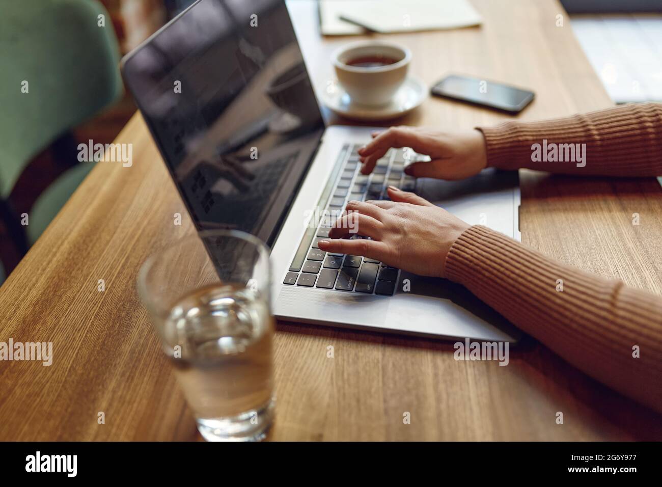 Woman working laptop cup coffee hi-res stock photography and images - Alamy