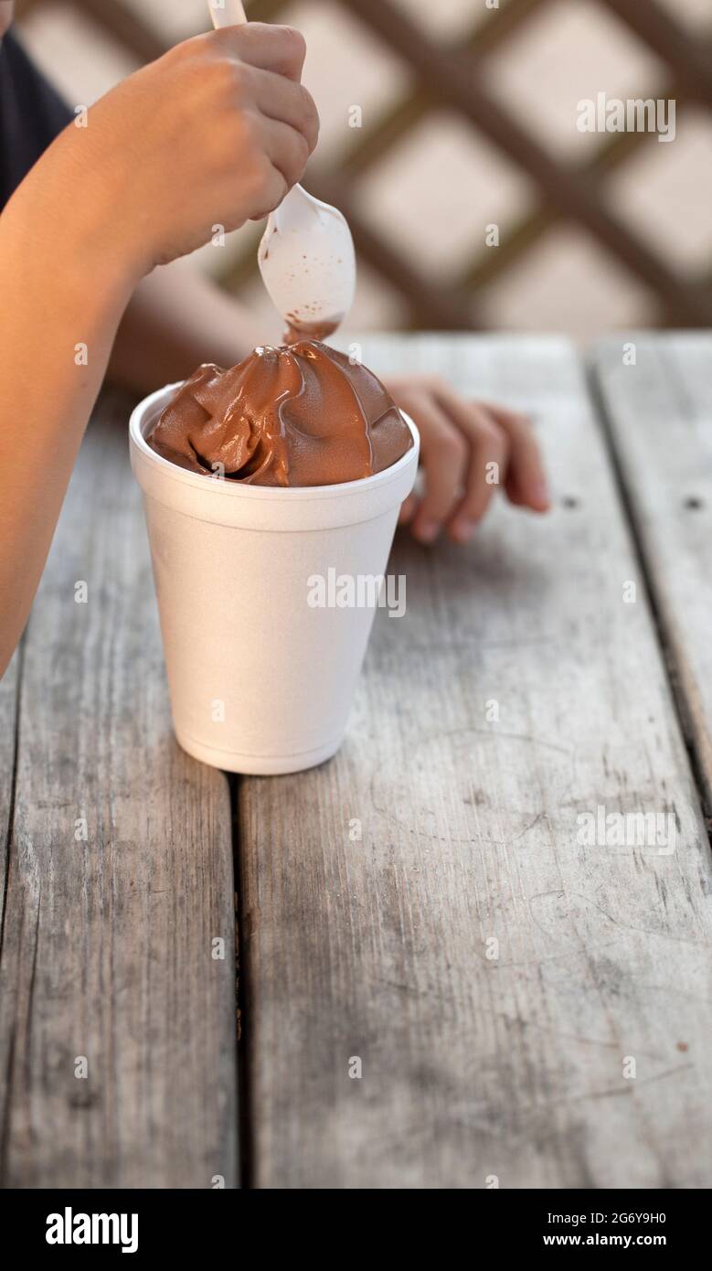 Hand scooping ice cream hi-res stock photography and images - Alamy