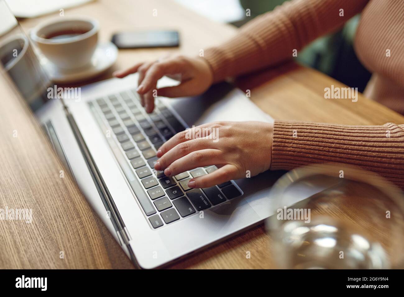 Female hands young woman typing hi-res stock photography and images - Alamy