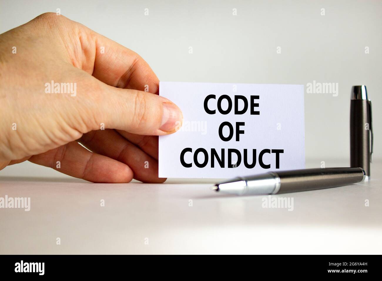 Code Of Conduct Symbol White Paper With Words Code Of Conduct In