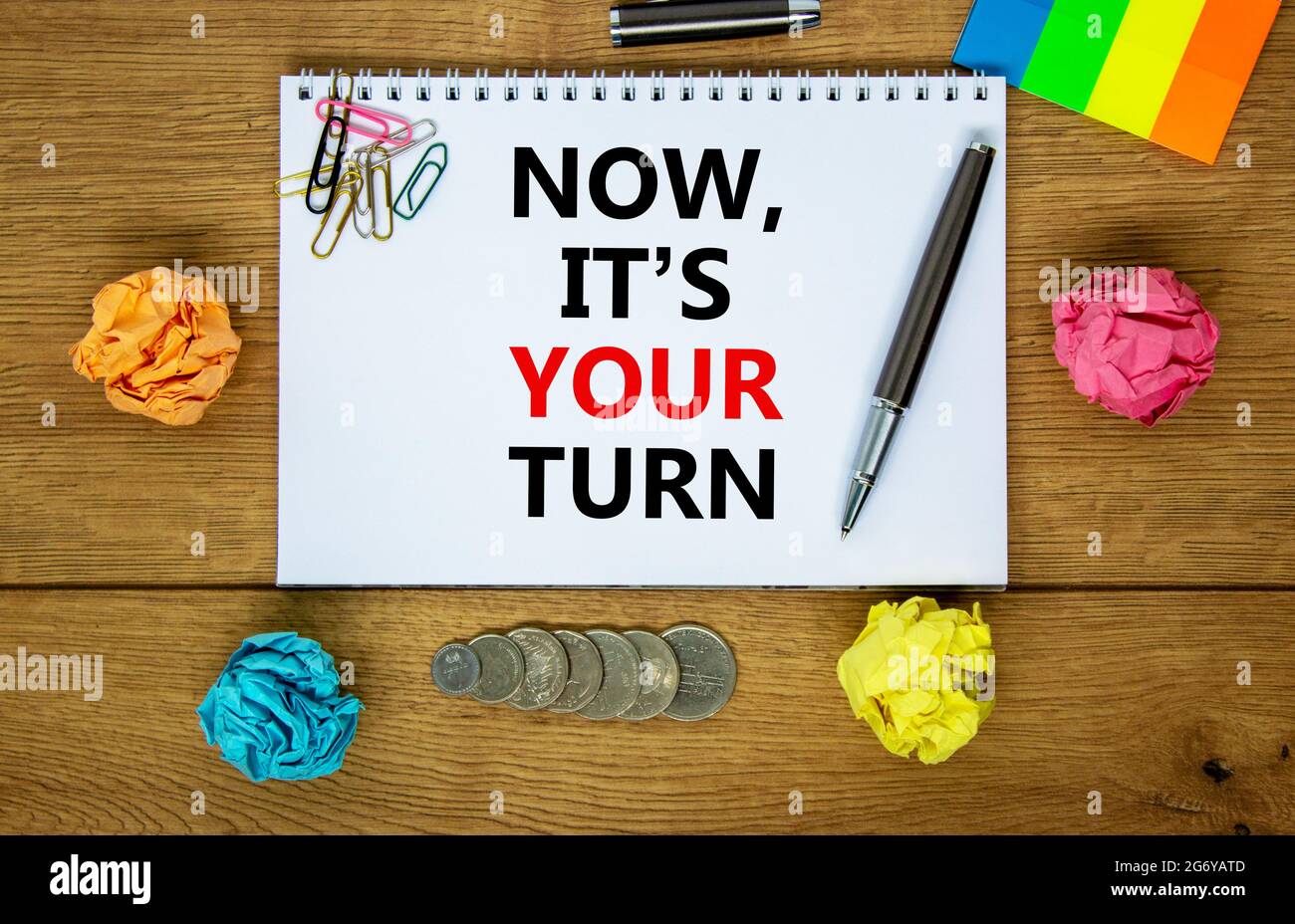 Now it is your turn symbol. Words 'Now it is your turn' on white note ...