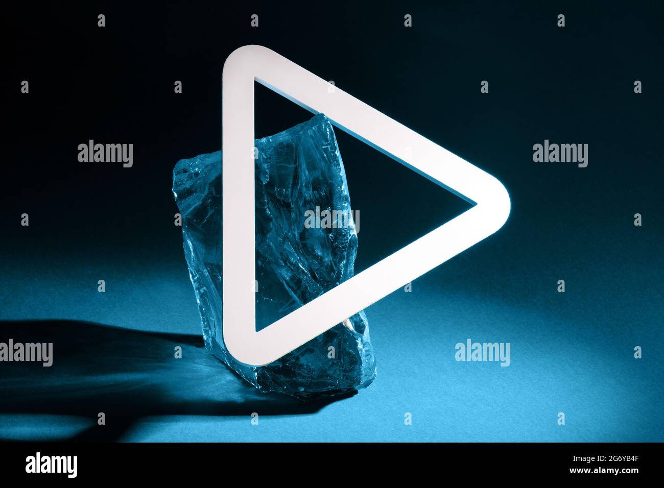 Play sign over dark blue background, media play technology Stock Photo ...