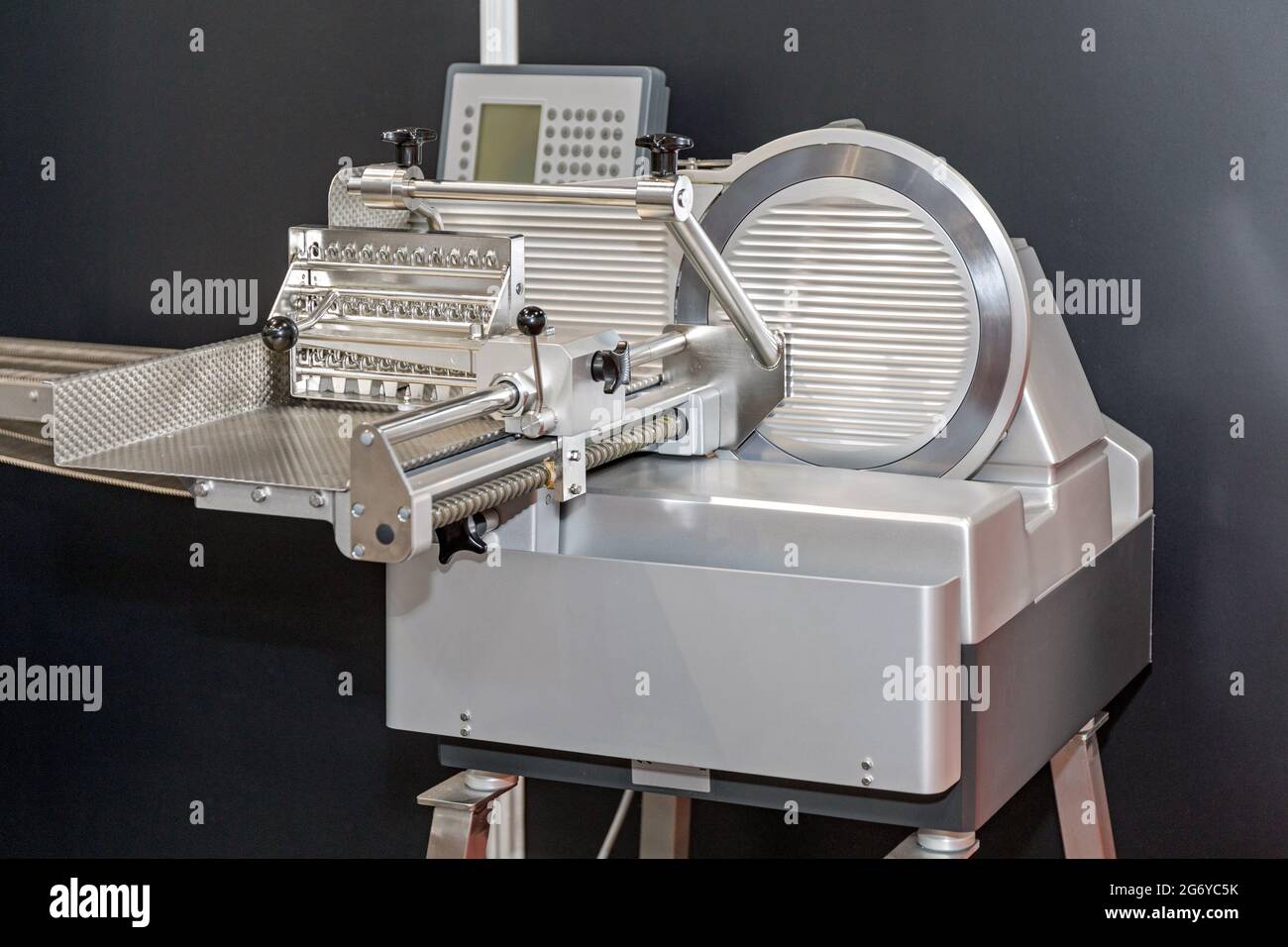 Big Automated Meat Slicer in Food Production Factory Stock Photo - Alamy