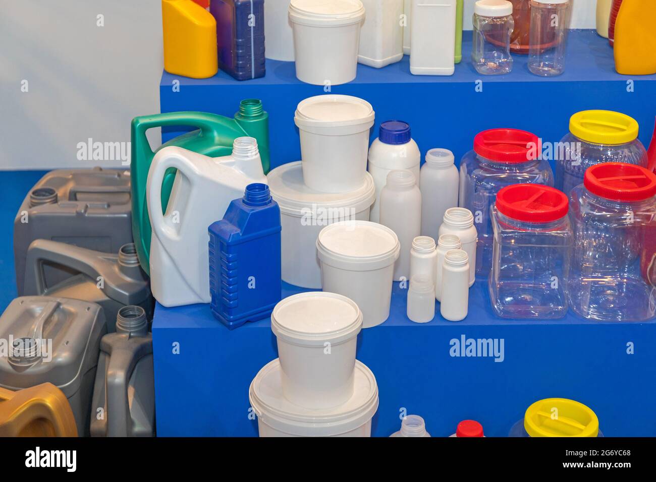 New Plastic Buckets and Bottles for Industry Production Stock Photo - Alamy