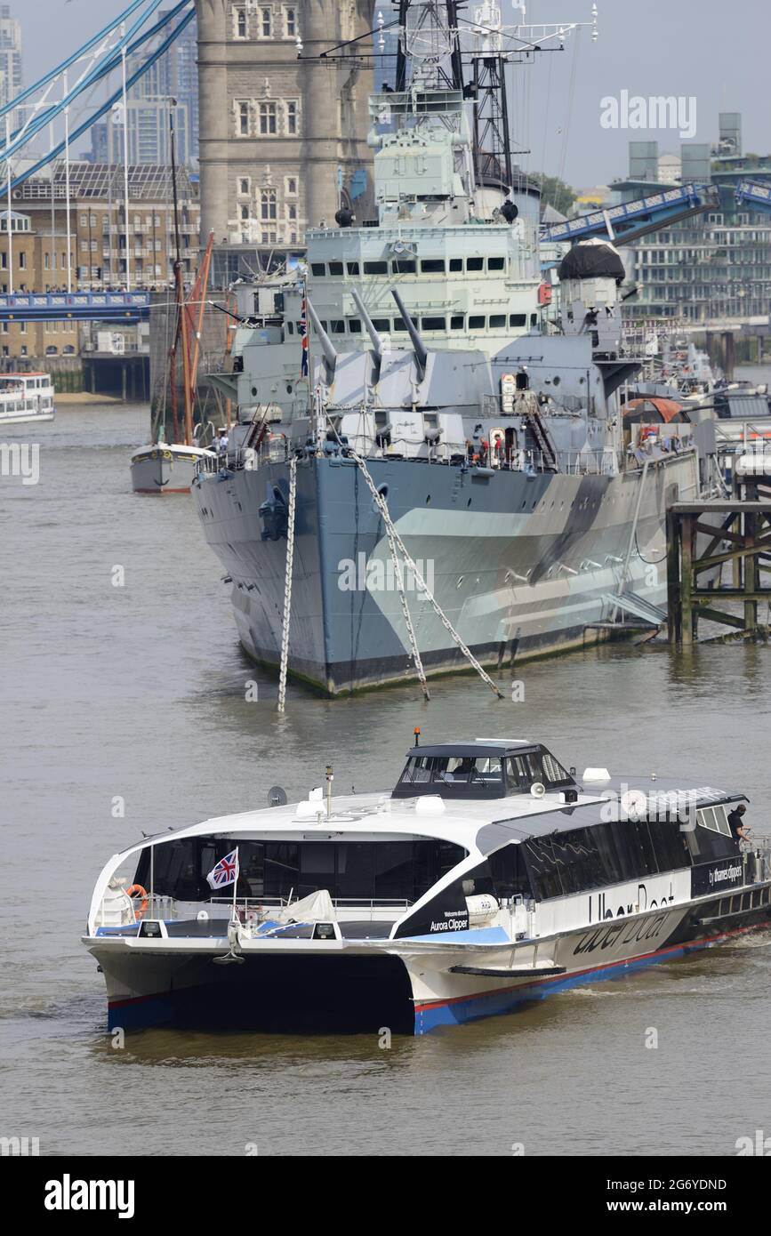 London, England, UK. Uber Boat / Thames Clipper, near HMS Belfast ...