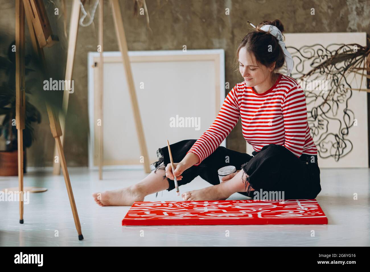 Artist creating artwork woman painting hi-res stock photography and ...