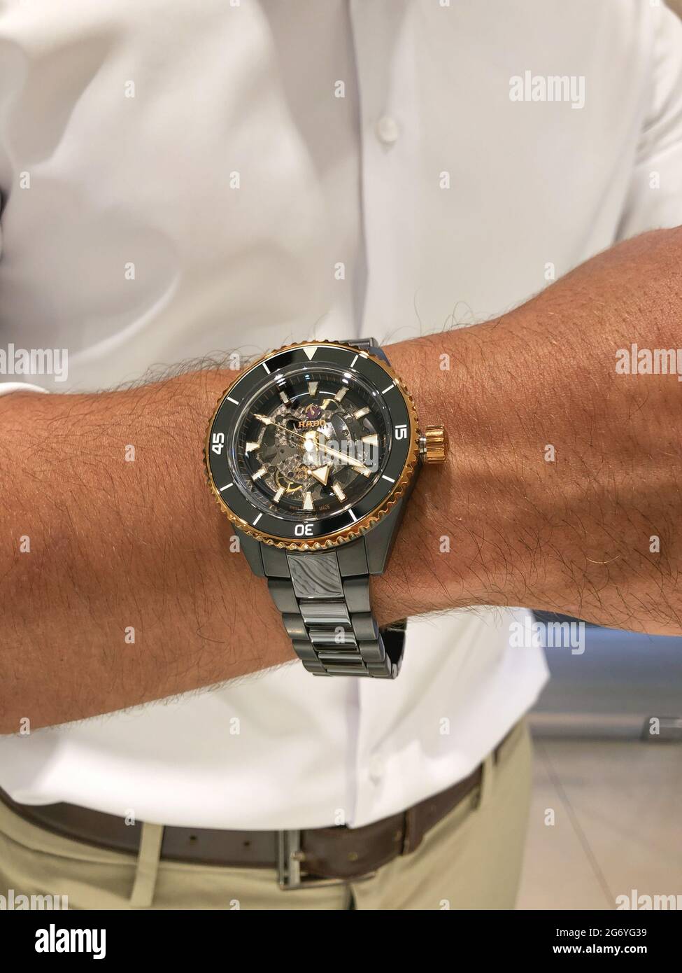 Alicante, Spain - June, 2021: young man wearing luxury black ceramic ...