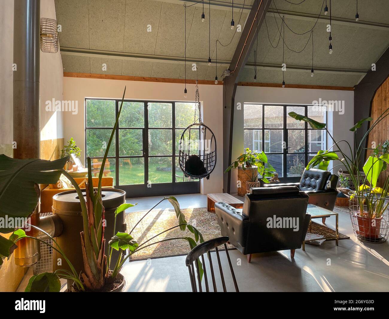 Trendy interior with a retro touch. Midcentury modern furniture ...
