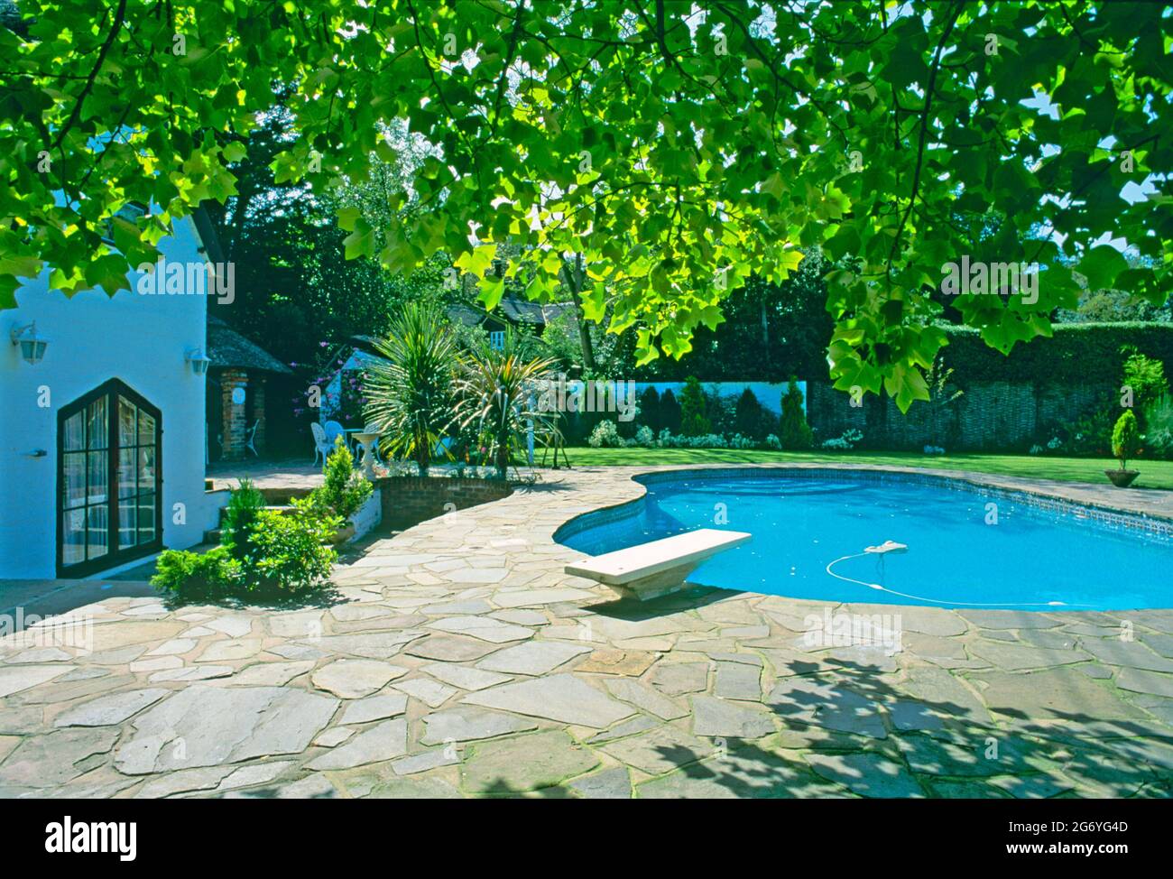 UK, garden, with swimming pool Stock Photo - Alamy