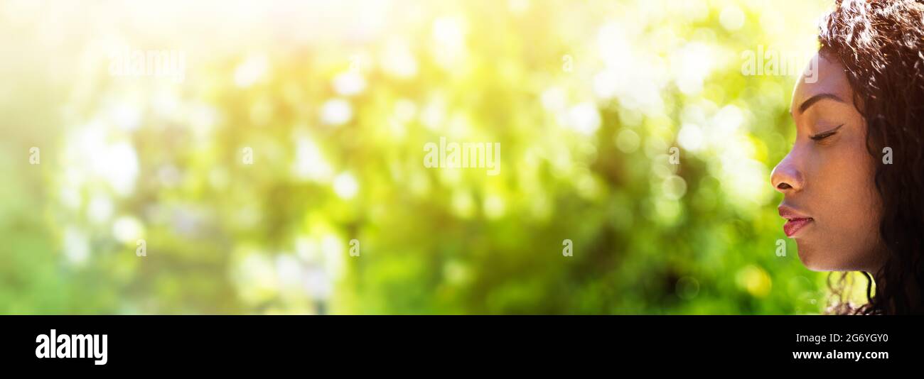 Woman Breathing Clean Air Smell With Eyes Closed Stock Photo - Alamy