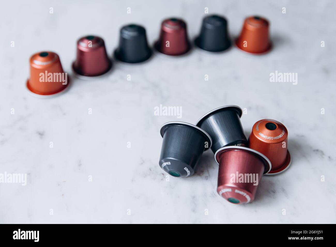 Assorted colorful capsules for coffee machine Stock Photo - Alamy