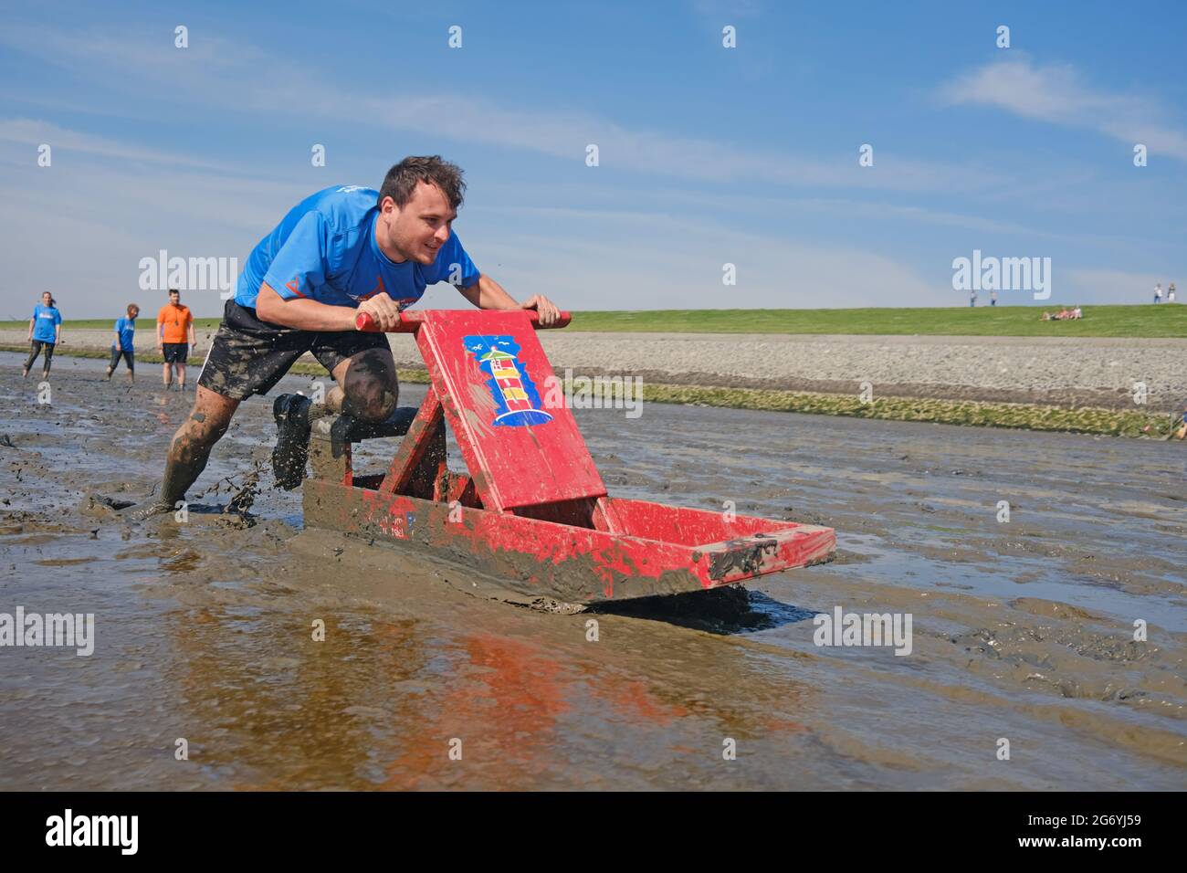 Greetsiel, Germany. 09th July, 2021. Thilo Hoppen is at the mud sledge ...