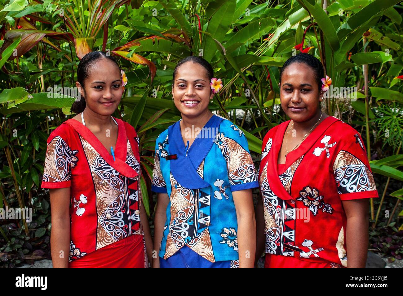 Three young women on Mana, Fiji Stock Photo - Alamy