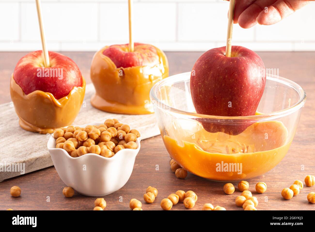 Making Caramel Apples a Perfect Fall Dessert Stock Photo - Alamy