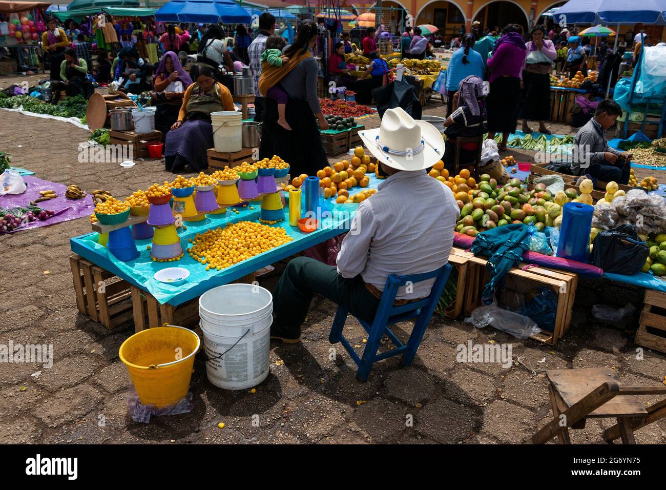 San Juan Chamula, Mexico - May 11, 2014: A man selling fruits at a ...