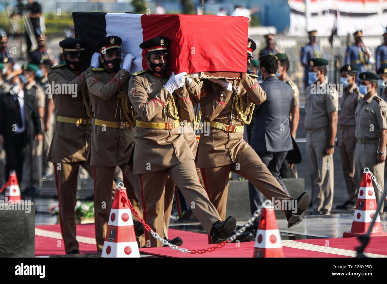 09 July 2021, Egypt, Cairo: Egyptian honour guards carry the flag ...
