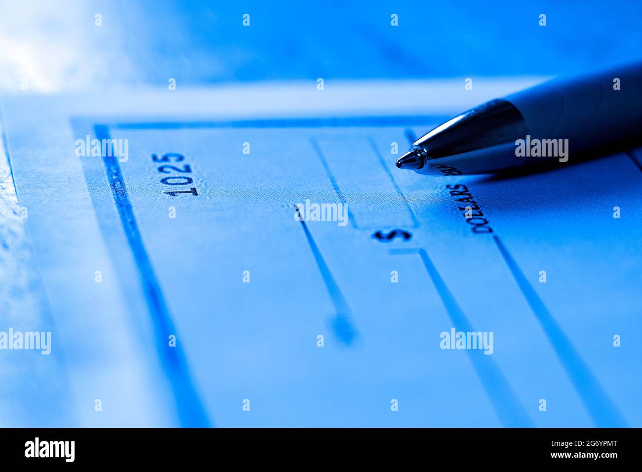 Detail of Pen for writing check payment cheque sign Stock Photo - Alamy