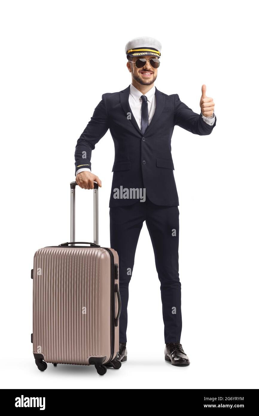 Full length portrait of a young handsome pilot with a suitcase ...