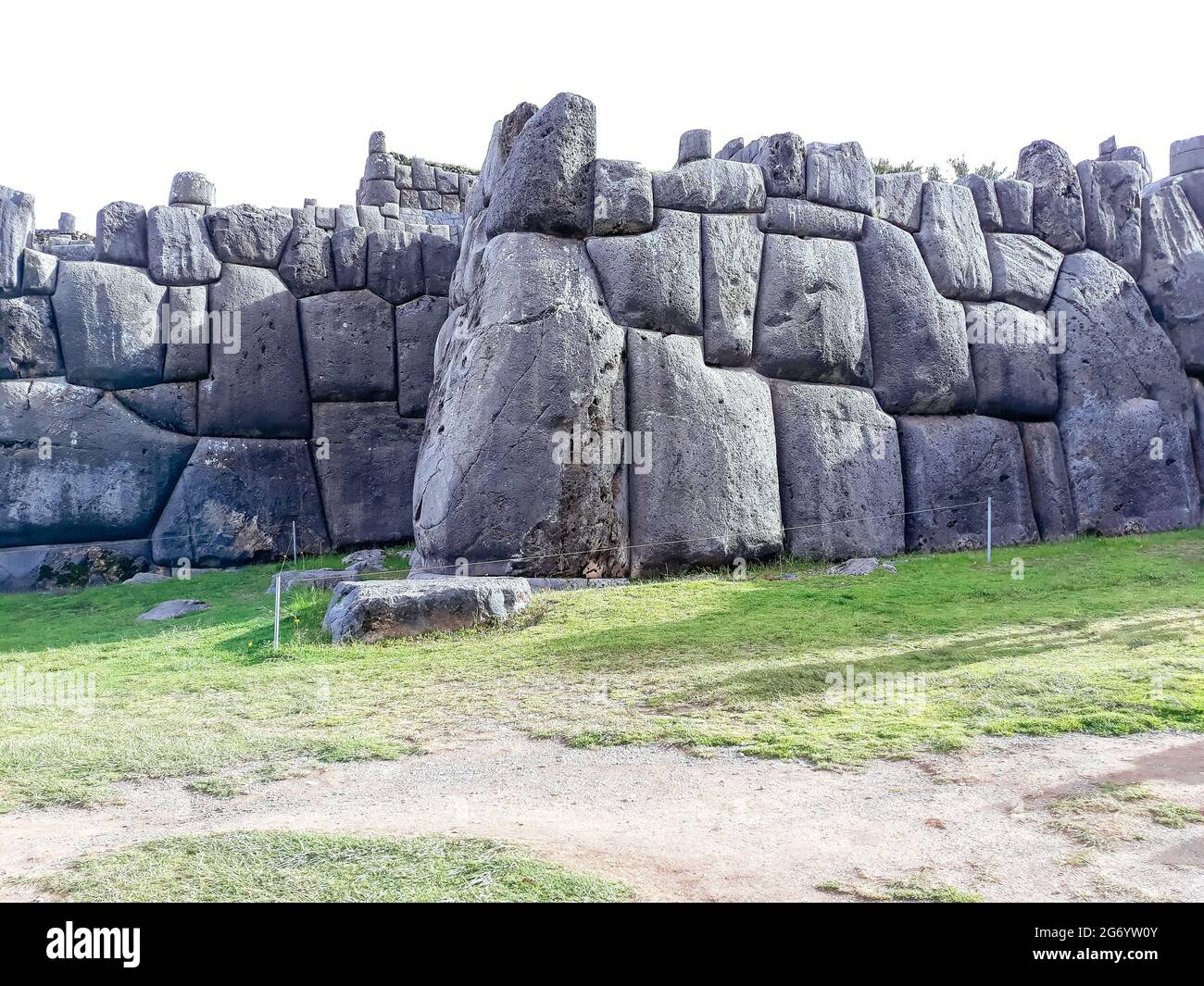 A fragment of the wall, built of huge stones of different shapes in ...