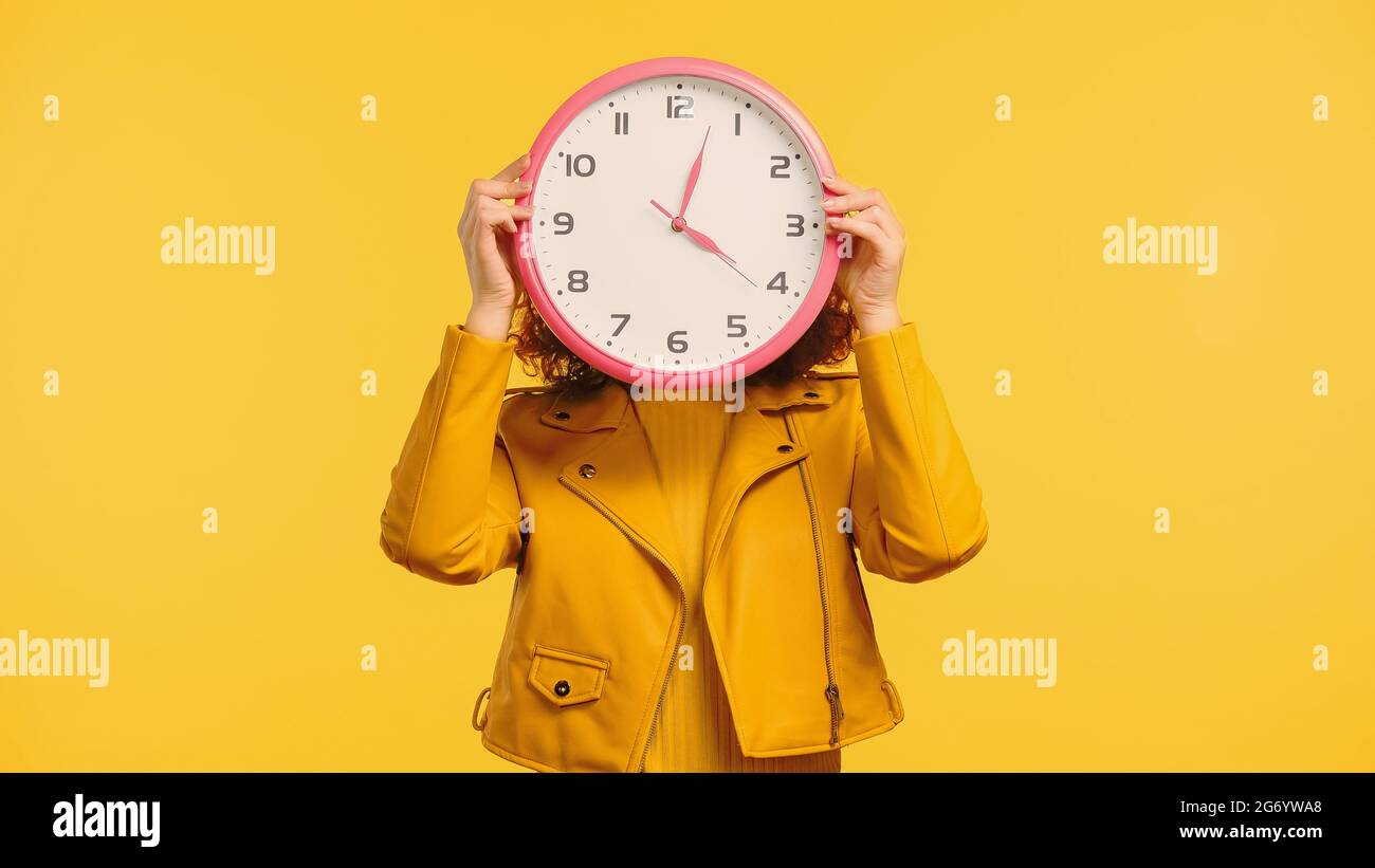 Beautiful shot yellow clock hi-res stock photography and images - Alamy