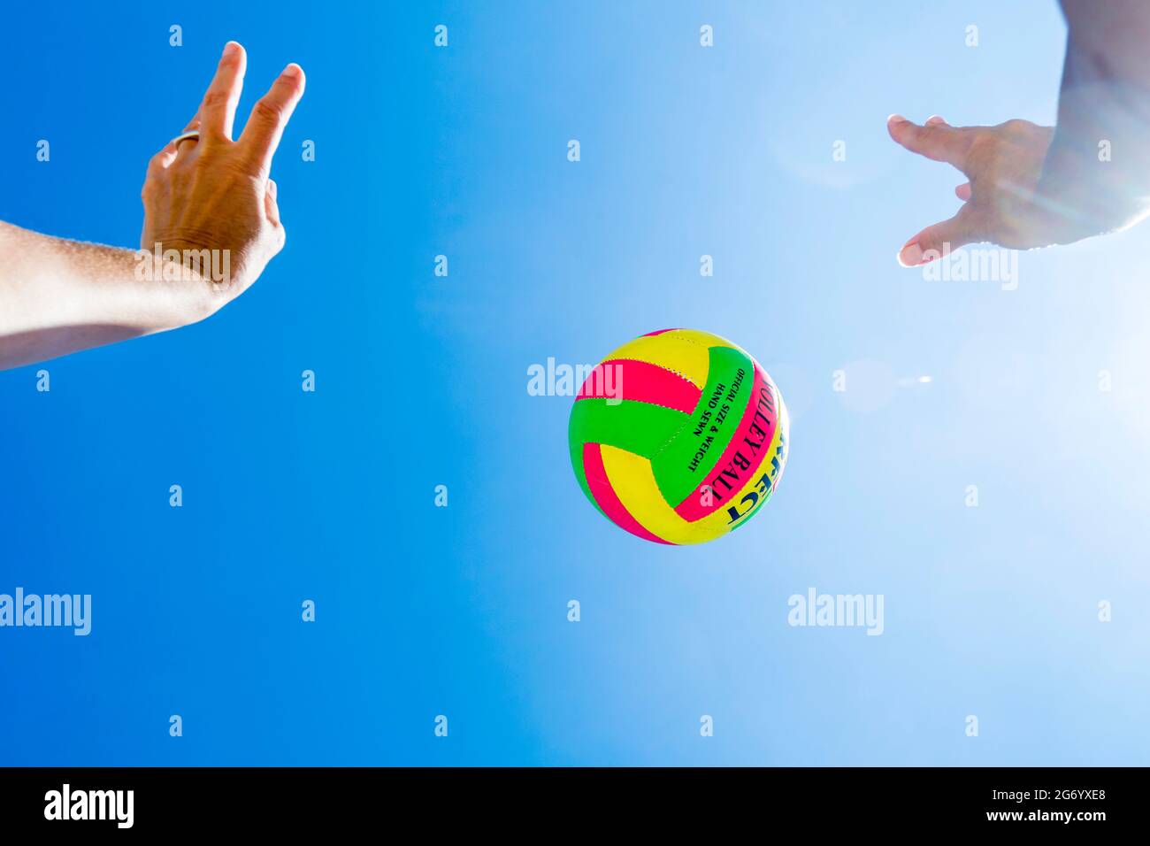 Hands receiving ball hi-res stock photography and images - Alamy