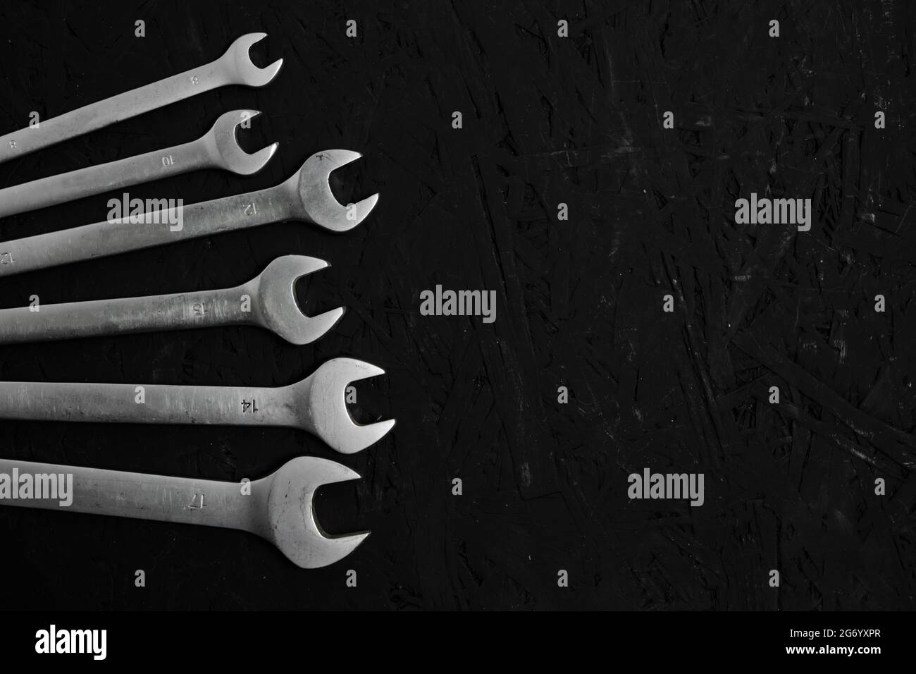 Set of wrenches on a black background Stock Photo - Alamy