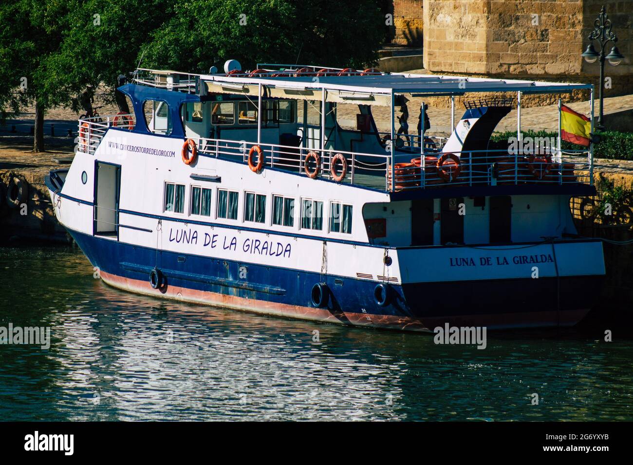 Seville Spain July 07, 2021 Tourist boats moored on the Guadalquivir ...