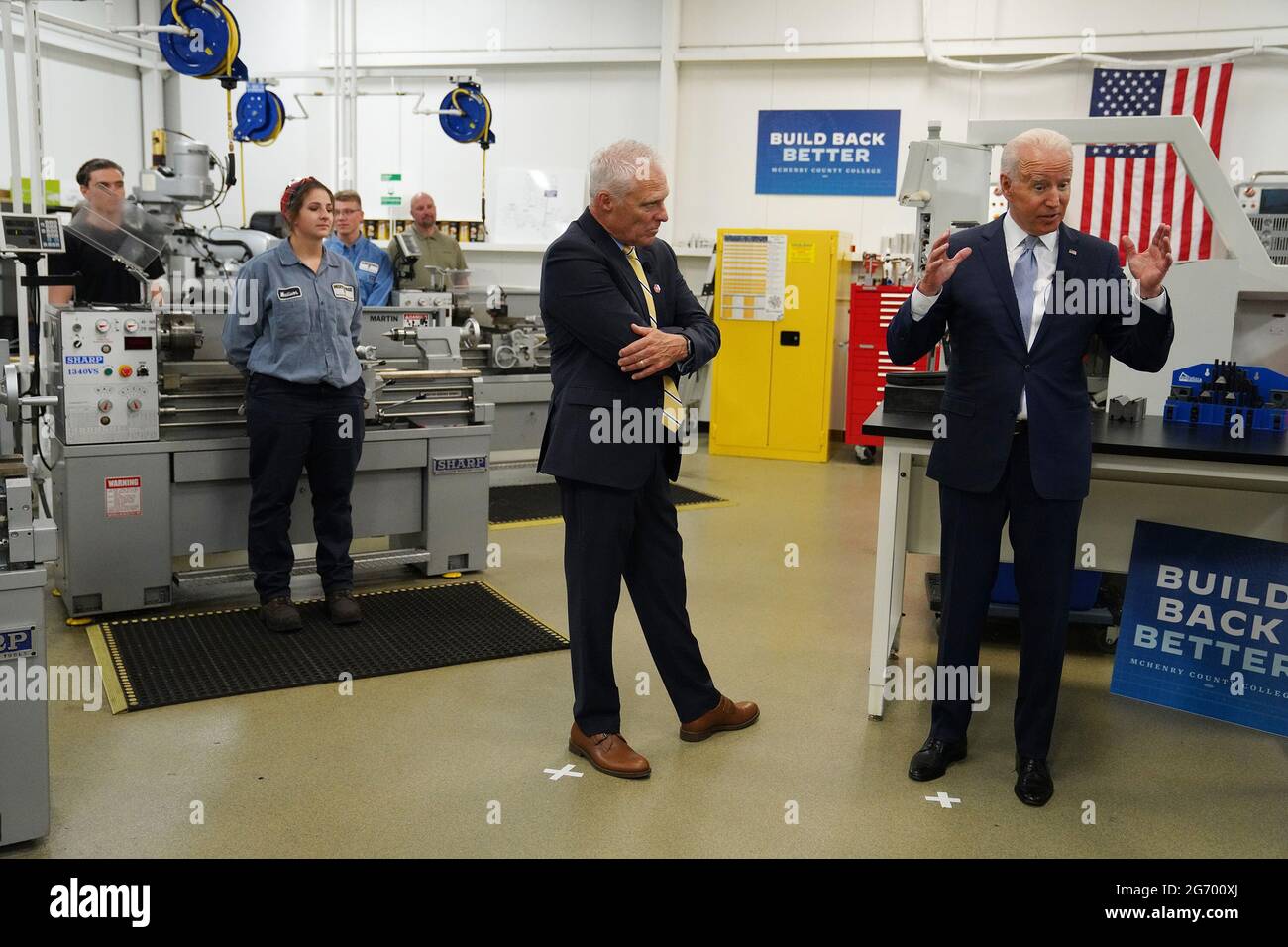 President Joe Biden, right, speaks with McHenry County College ...