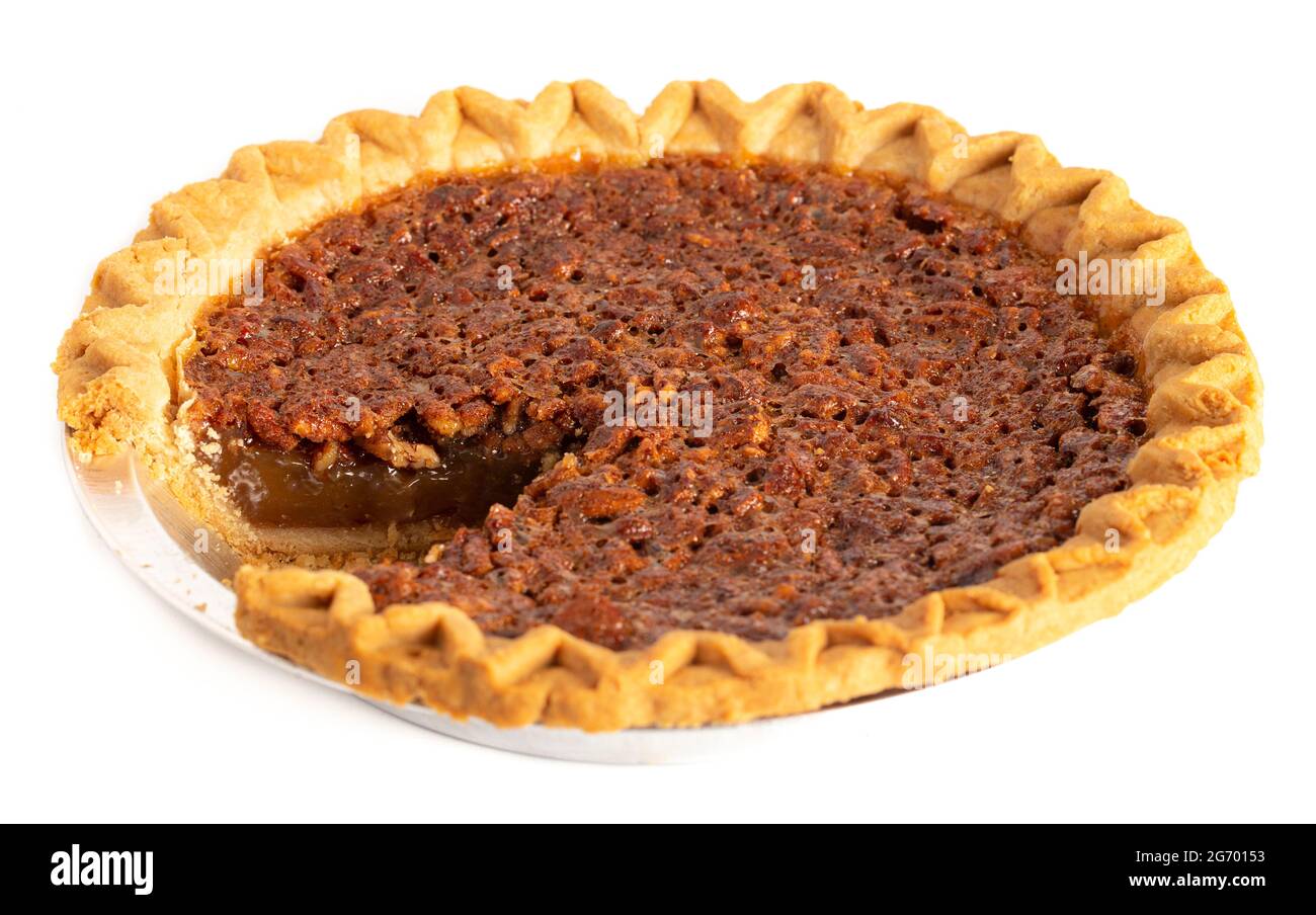 Traditional Pecan PIe with a Slice Cut Out Isolated on a White ...