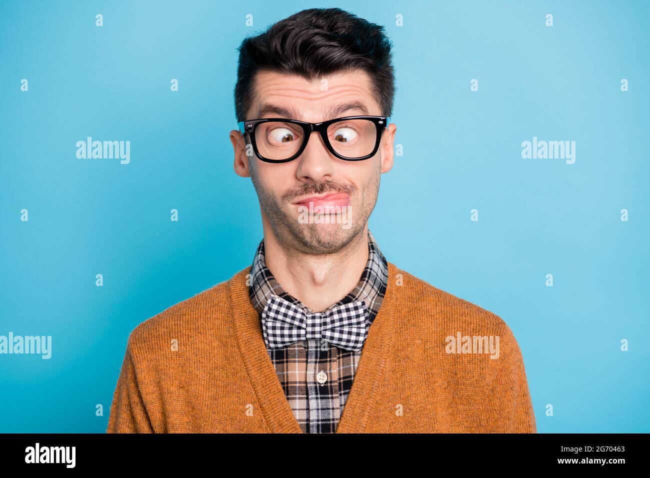 Photo of funny fooling young bristled man make funny face free time ...