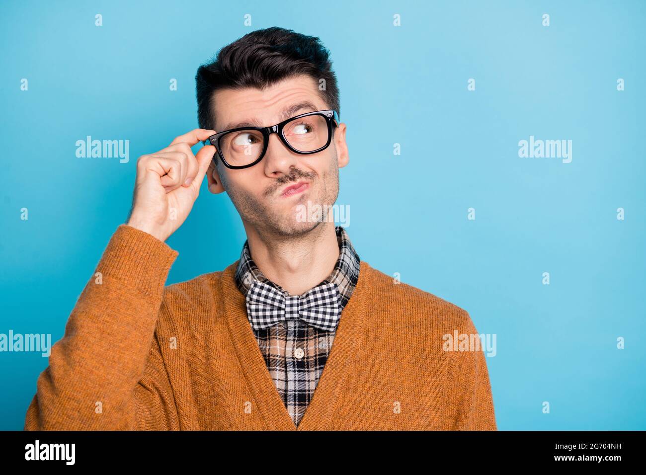 Portrait of handsome person hand touch eyewear look interested empty ...