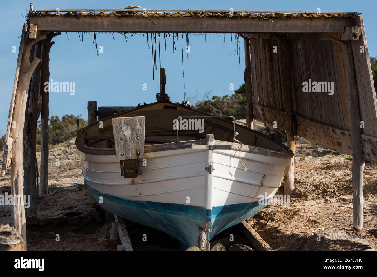 Fisherman's rustic boat on the beach Stock Photo - Alamy