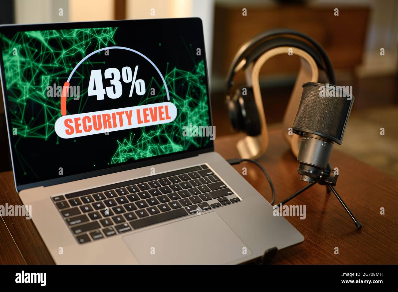 Laptop computer with low security displayed on screen Stock Photo - Alamy