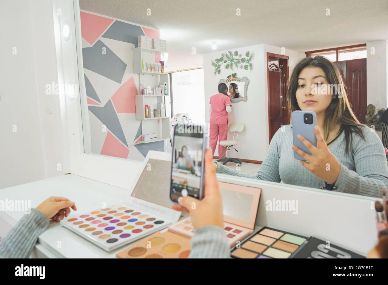 Young woman getting ready to put on makeup for a special event Stock Photo - Alamy