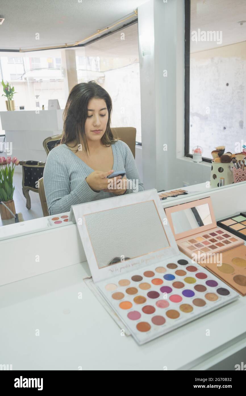 Young woman getting ready to put on makeup for a special event Stock ...