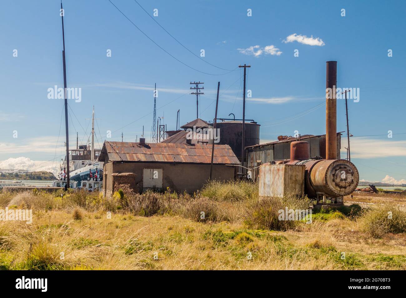 Old industrial buildings in a harbor of Puno, Peru Stock Photo - Alamy