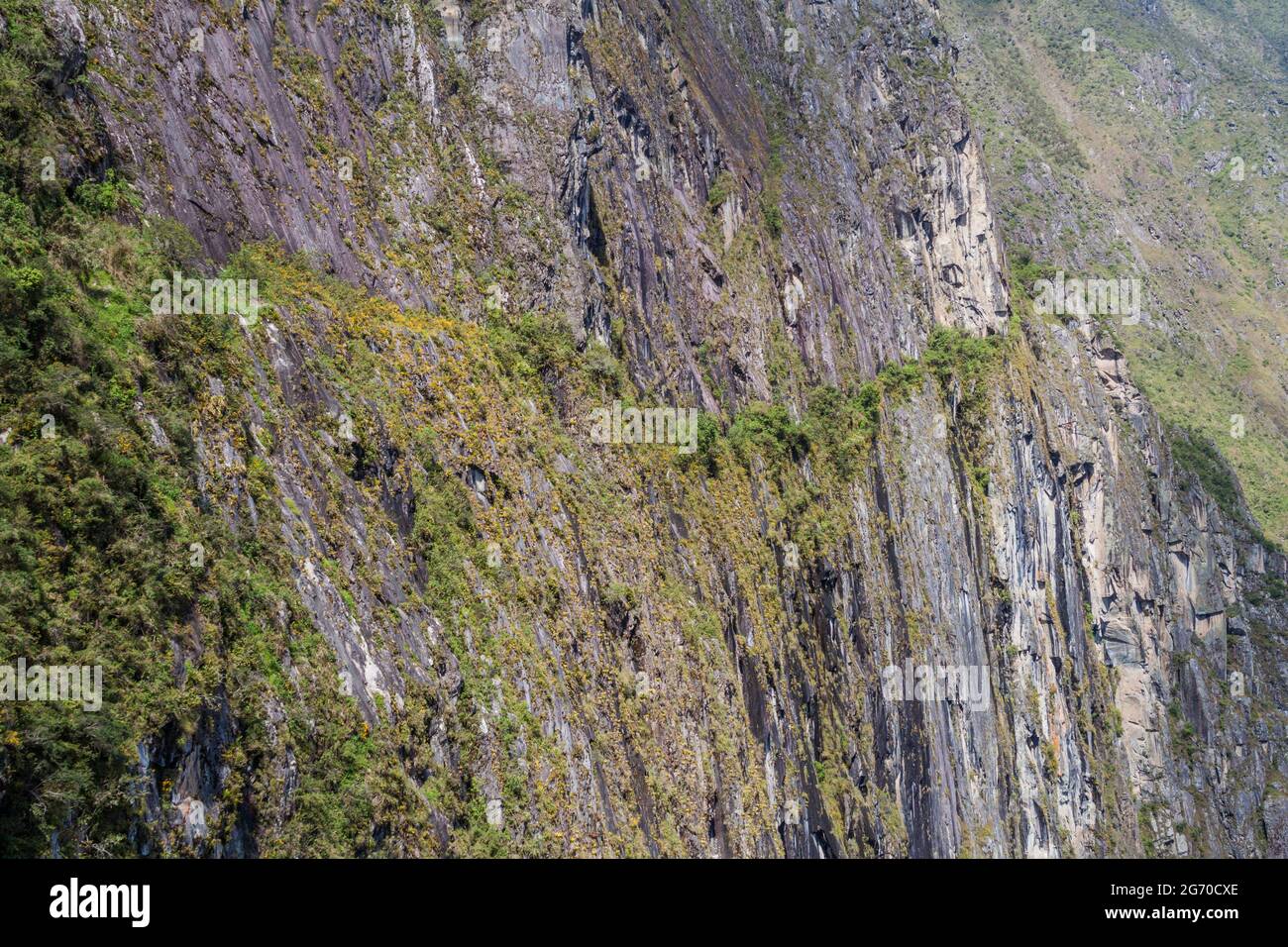 Inca trail carved into a stone wall near Machu Picchu ruins, Peru Stock ...
