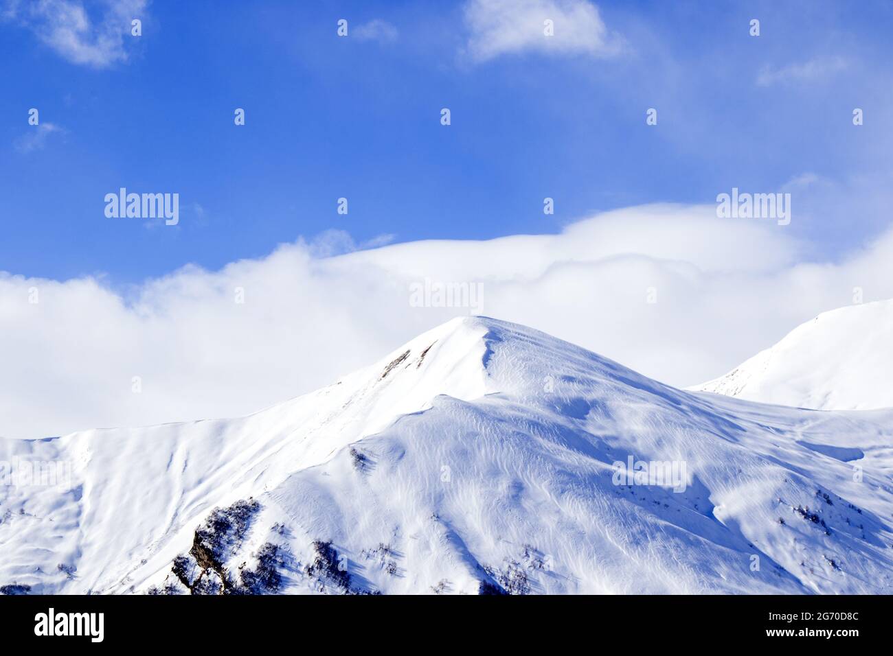 Beautiful view of snowy mountain landscapes in Gudauri, Georgia on a ...