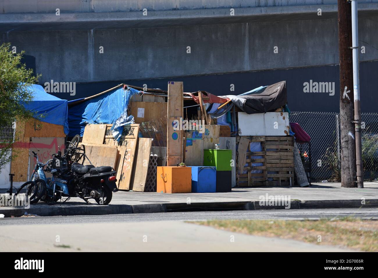 Los Angeles, CA USA - June 30, 2021:Plywood shantytown shelters an ...